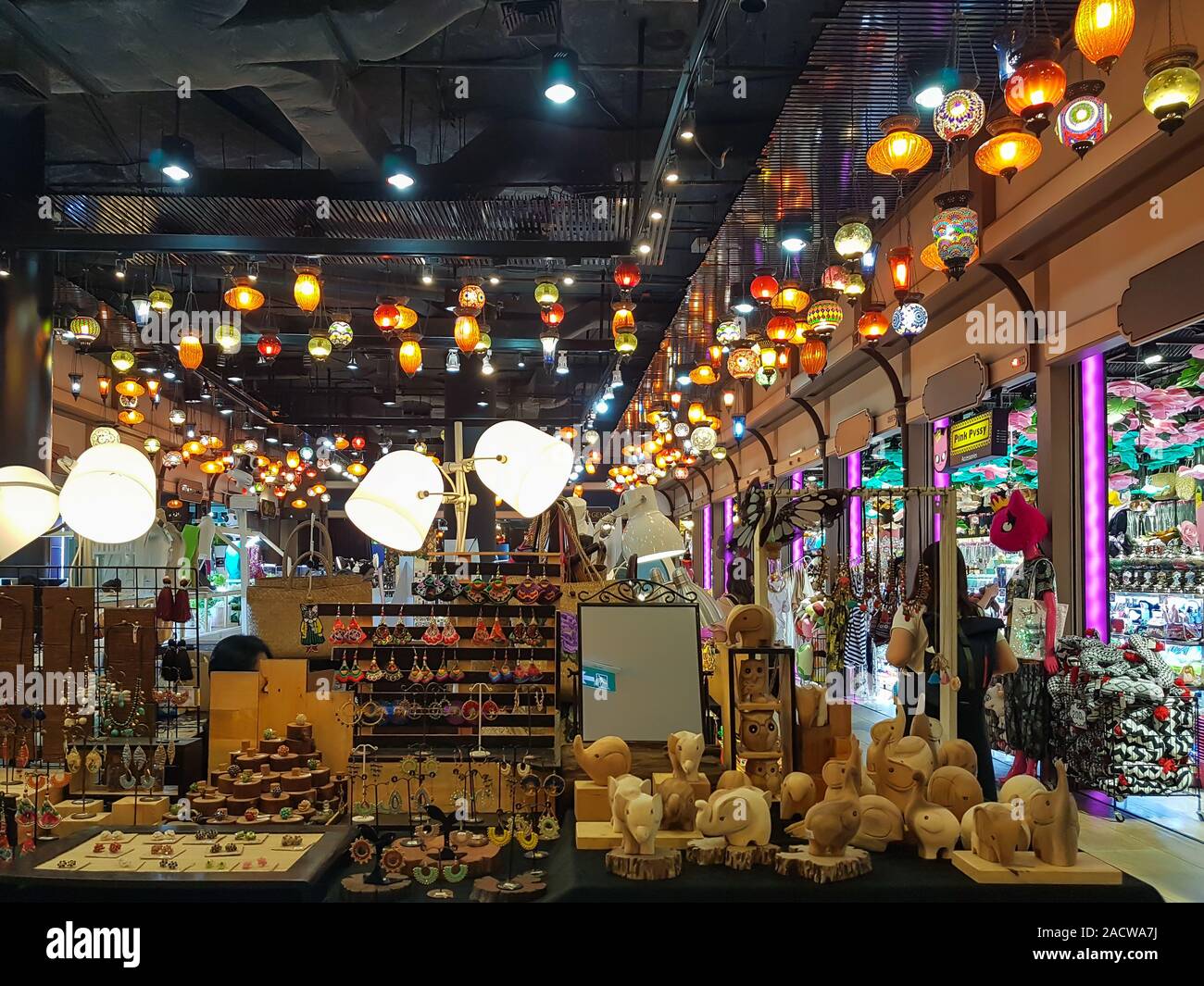 Shopping stalls and booth with overhead lights in Bangkok Thailand ...