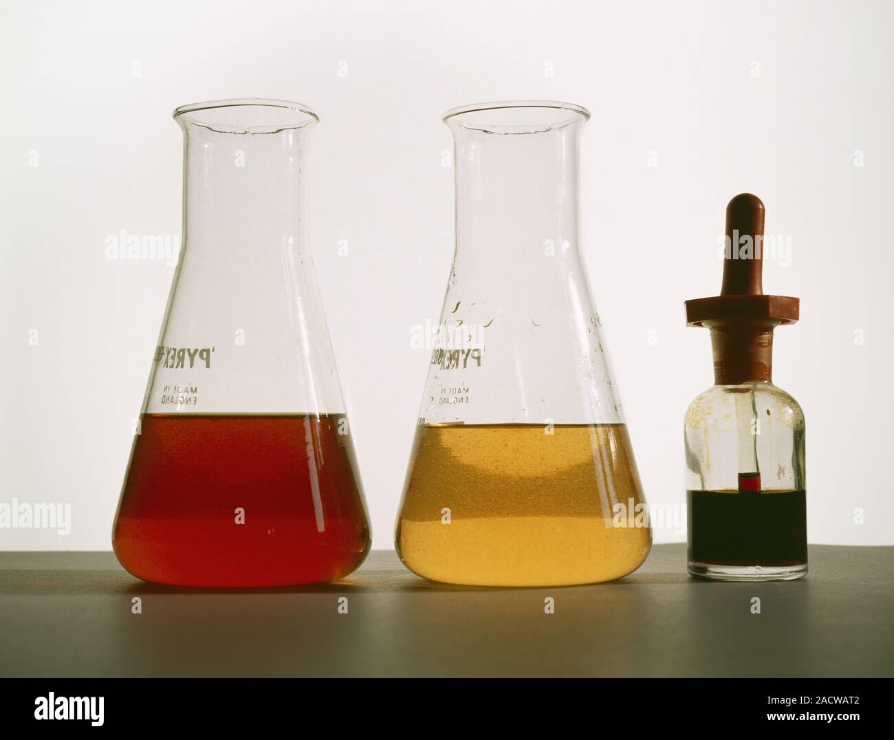 Iodine value test. Nut (left) and sunflower (centre) oils one hour ...