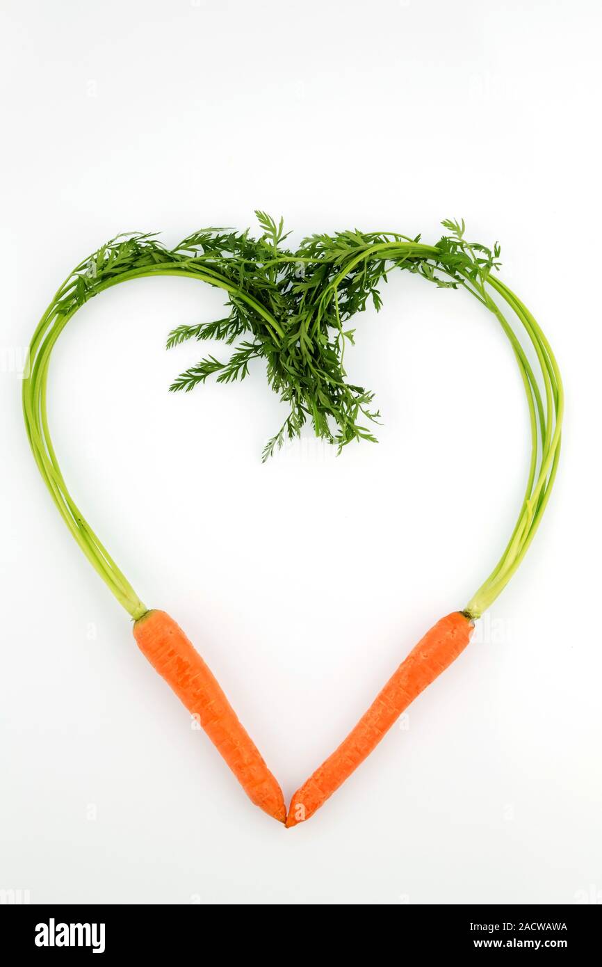 Fresh heart-shaped carrots Stock Photo - Alamy