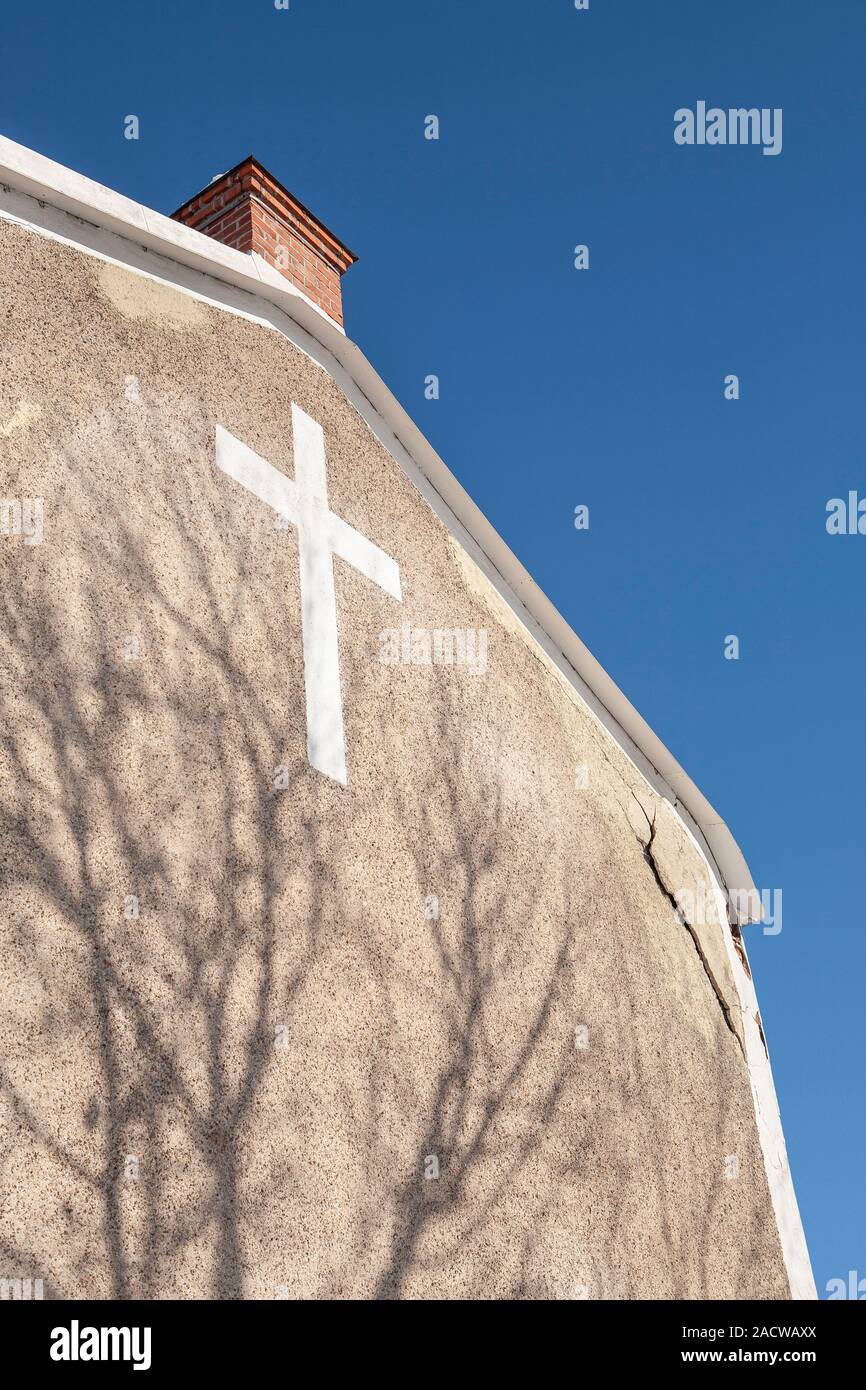 Cross on an empty wall with shadows from a tree Stock Photo - Alamy