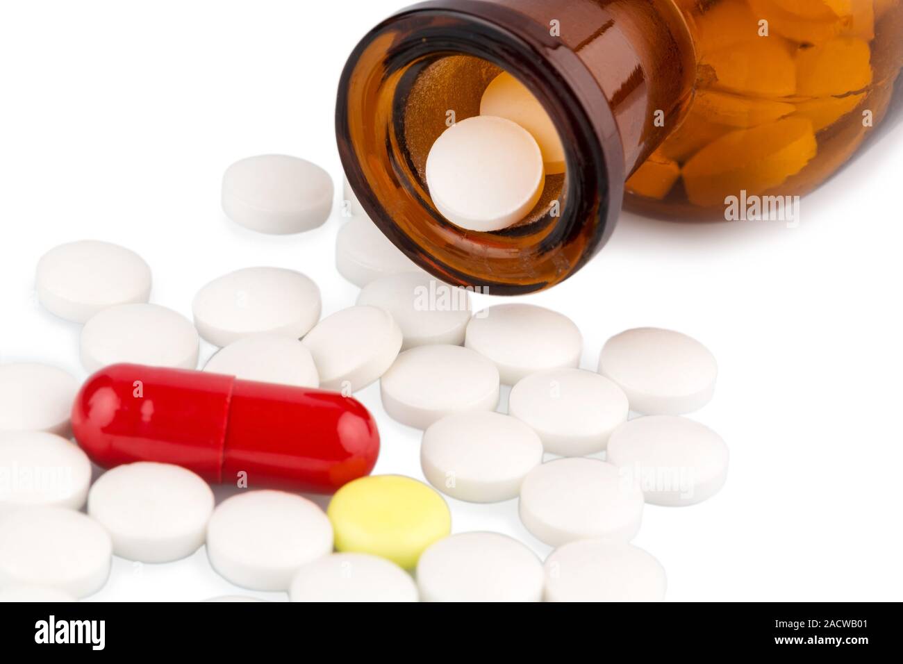 Many tablets with container Stock Photo - Alamy
