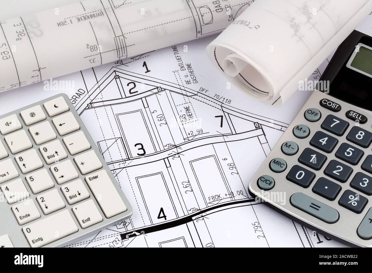 House plan with pocket calculator Stock Photo - Alamy