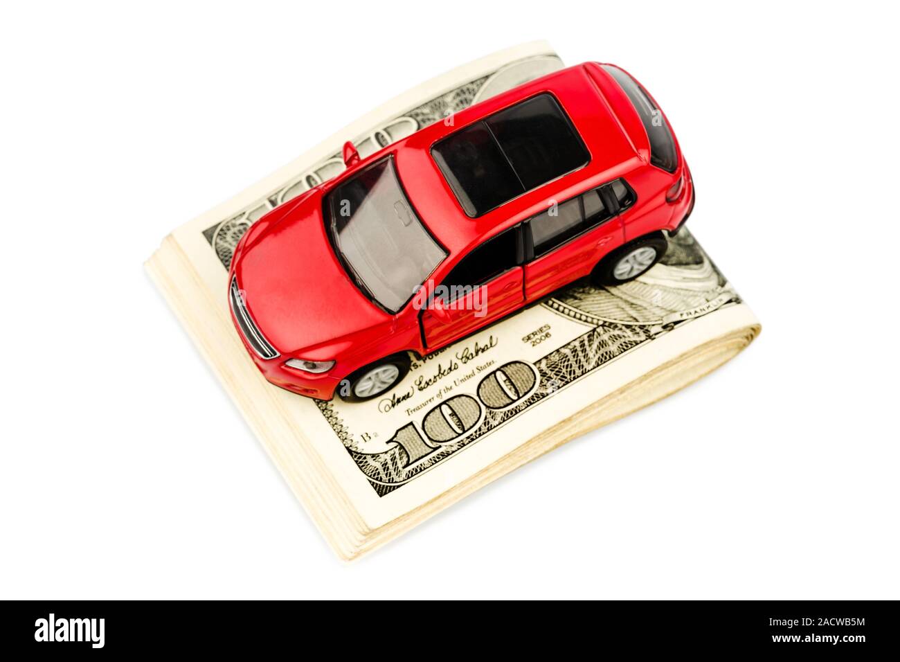Car on dollar banknotes Stock Photo - Alamy