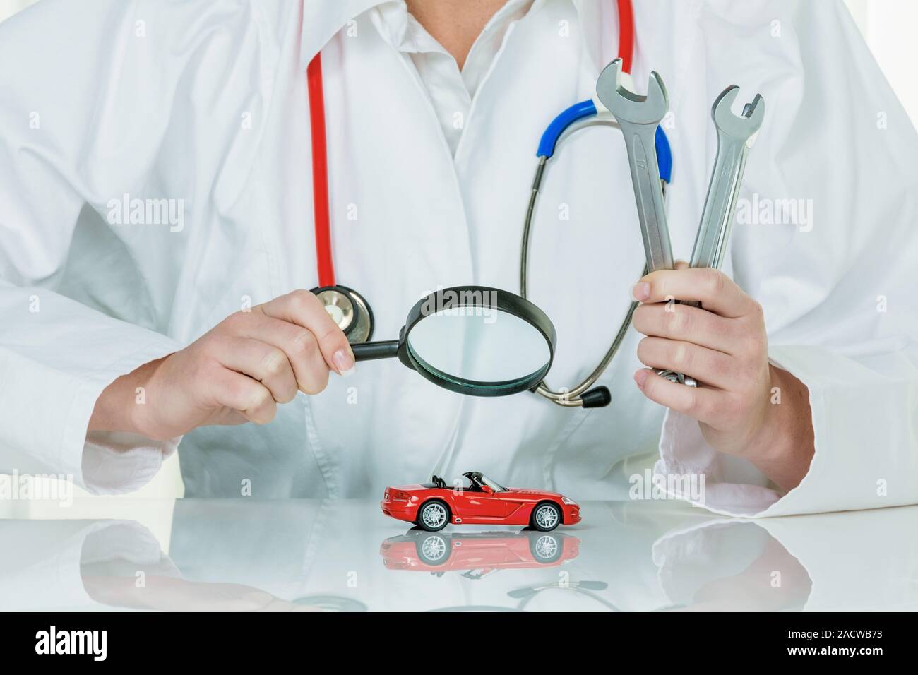 Car is examined by doctor Stock Photo - Alamy