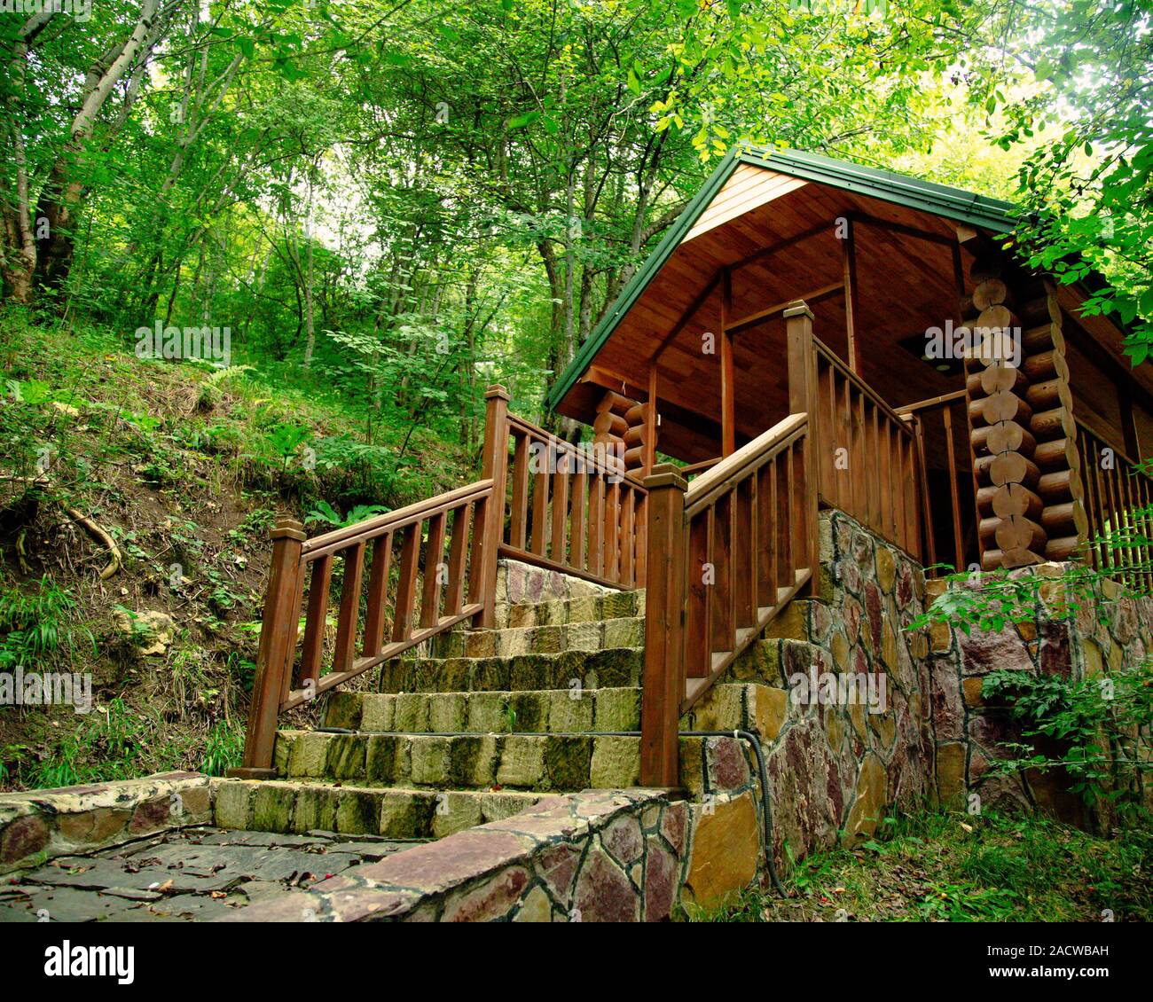 brick stairs with wooden railing Stock Photo - Alamy
