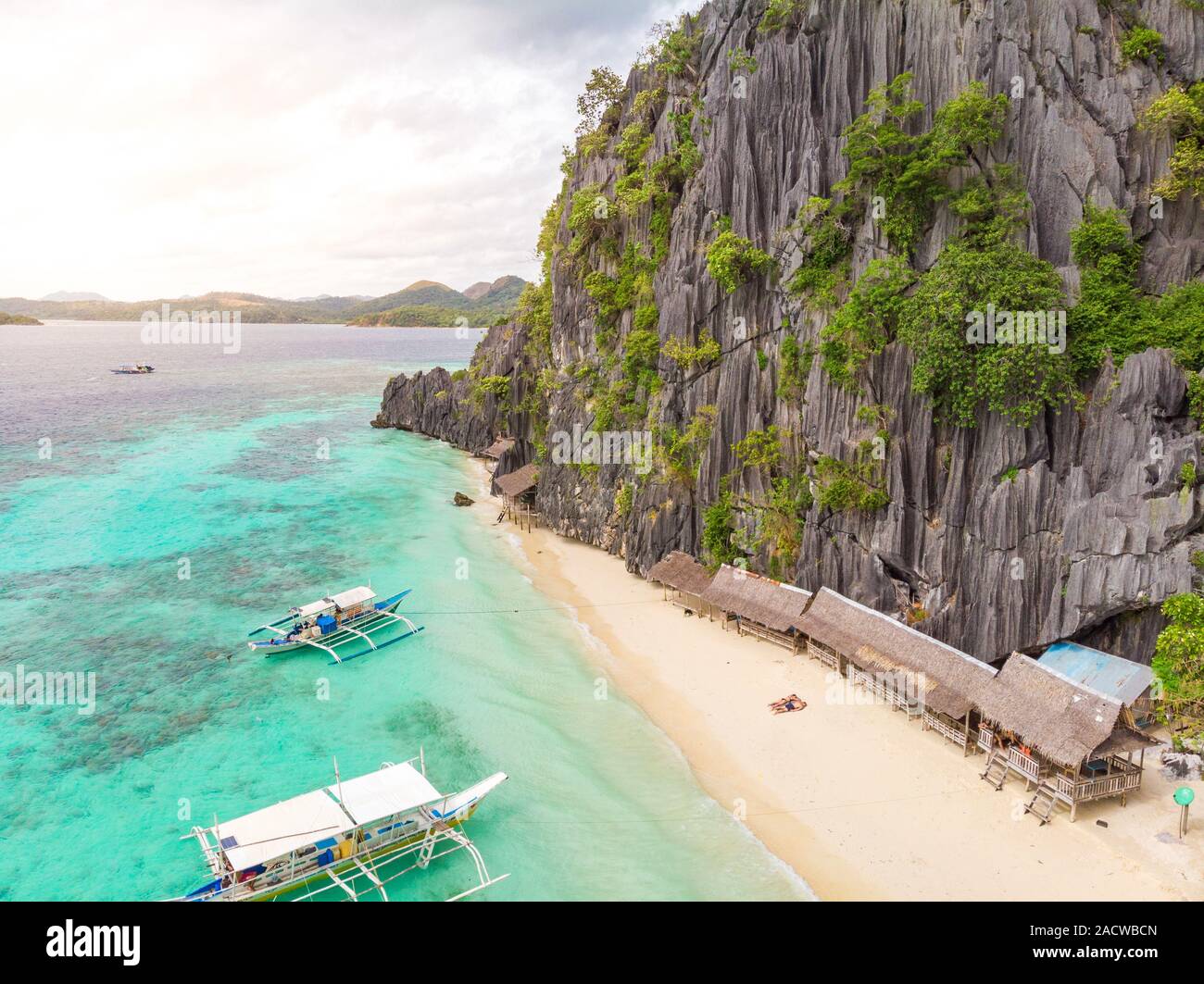 Aerial view of Banol Beach on paradise island, Coron, Palawan ...