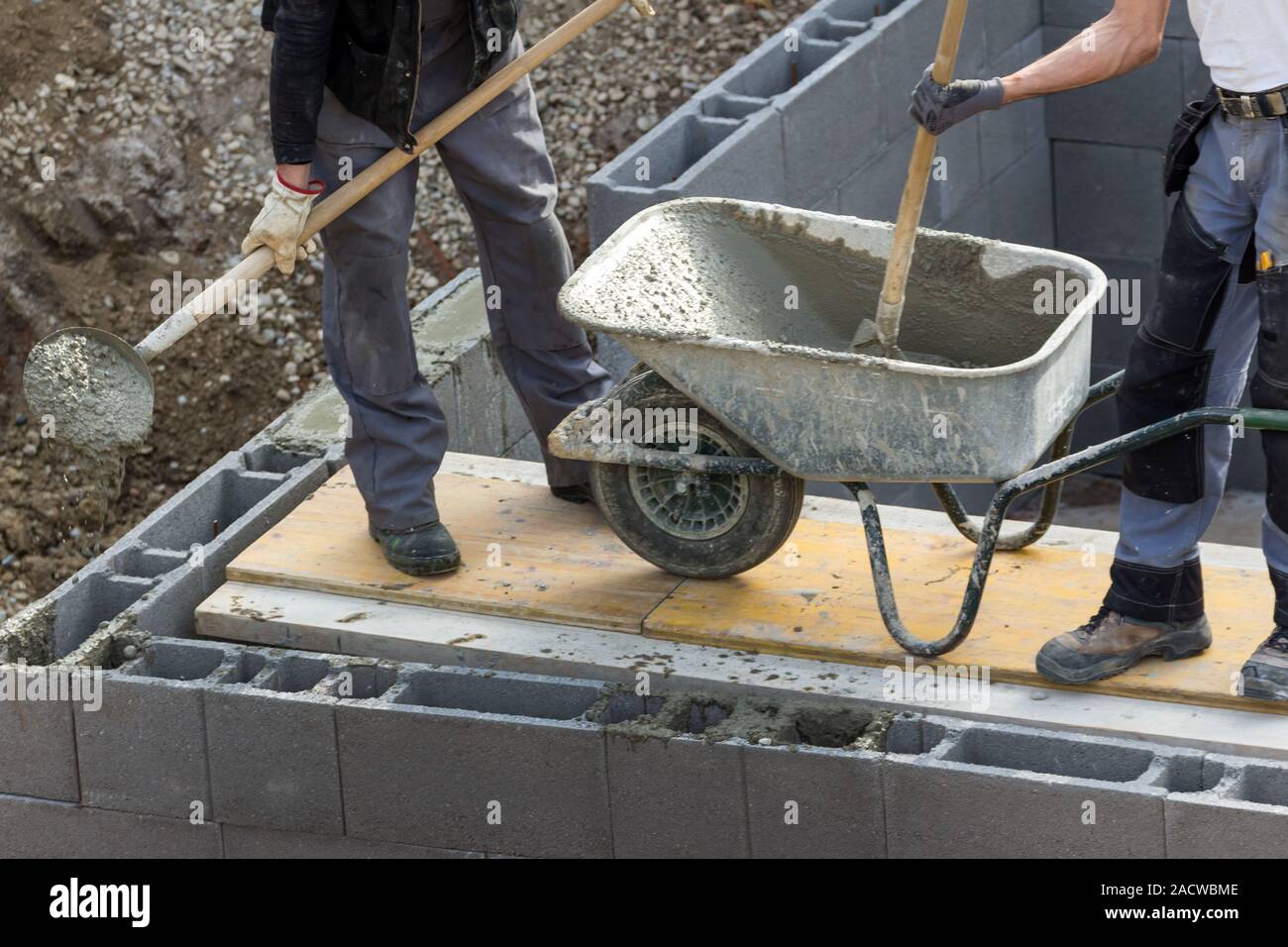 Working with concrete Stock Photo - Alamy