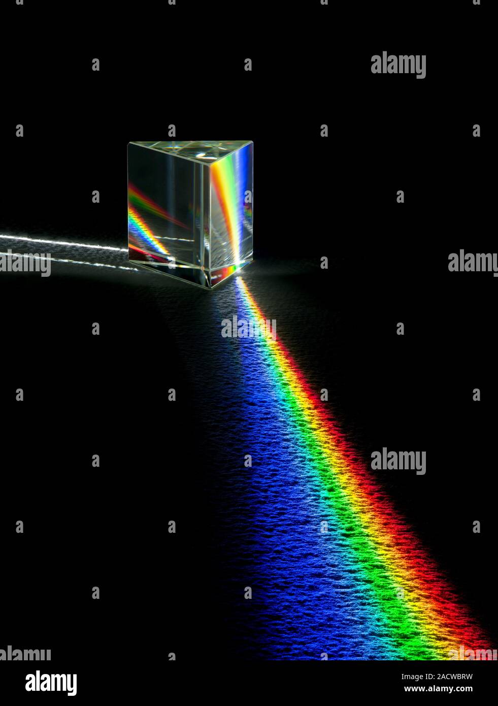 A prism demonstrating refraction and reflection effects. A beam of ...