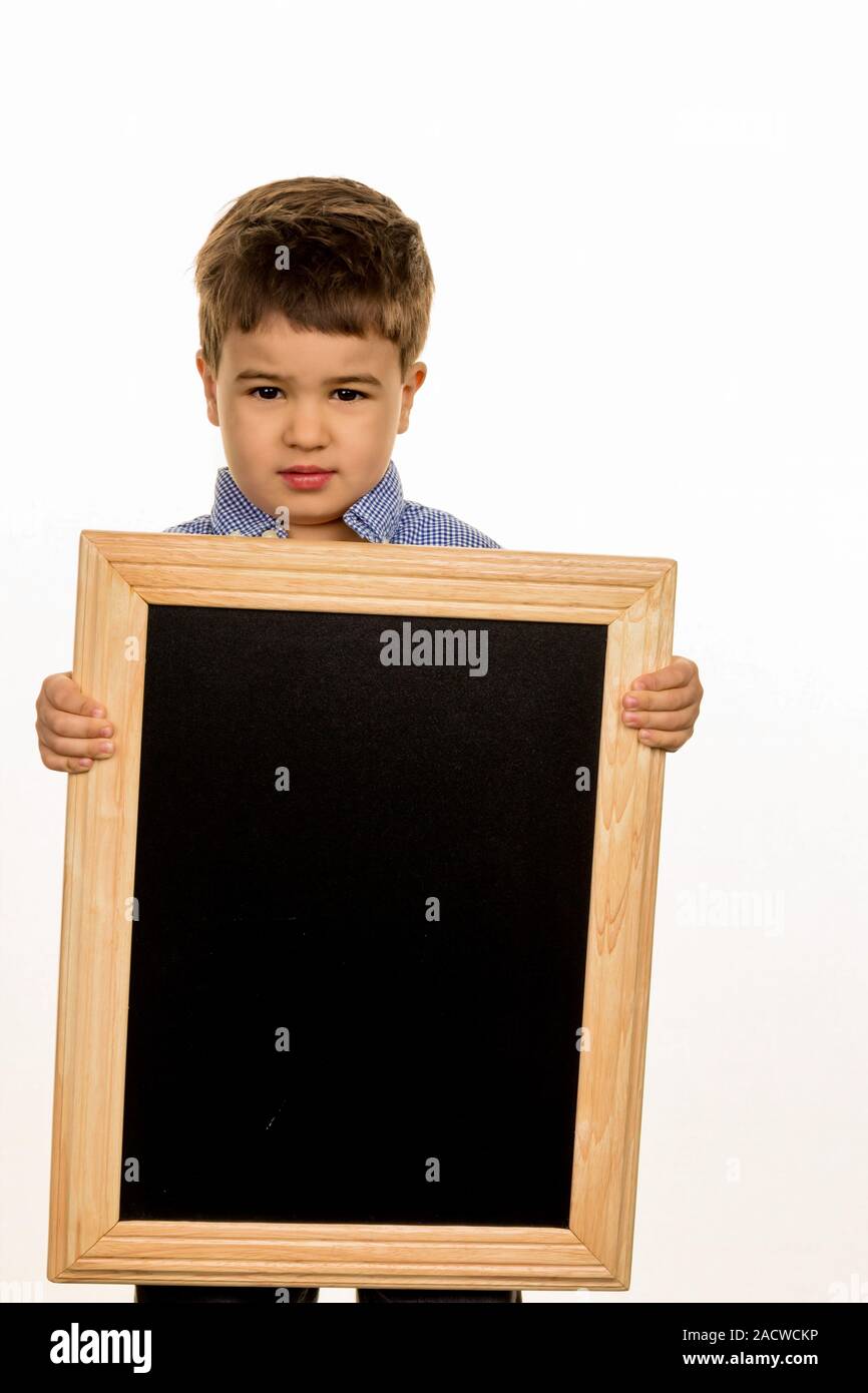 Little boy with chalkboard Stock Photo - Alamy