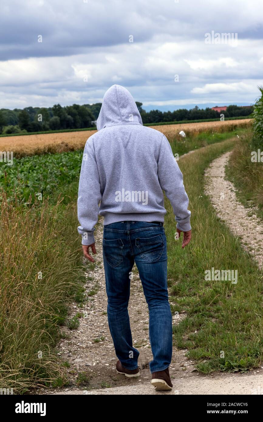 Man goes on his way Stock Photo - Alamy