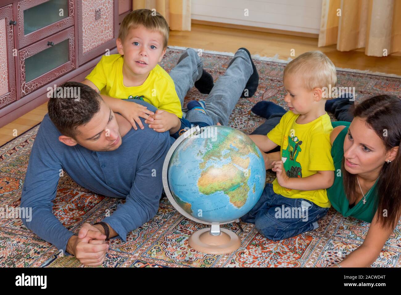 Family Plans Holiday Trip Stock Photo Alamy