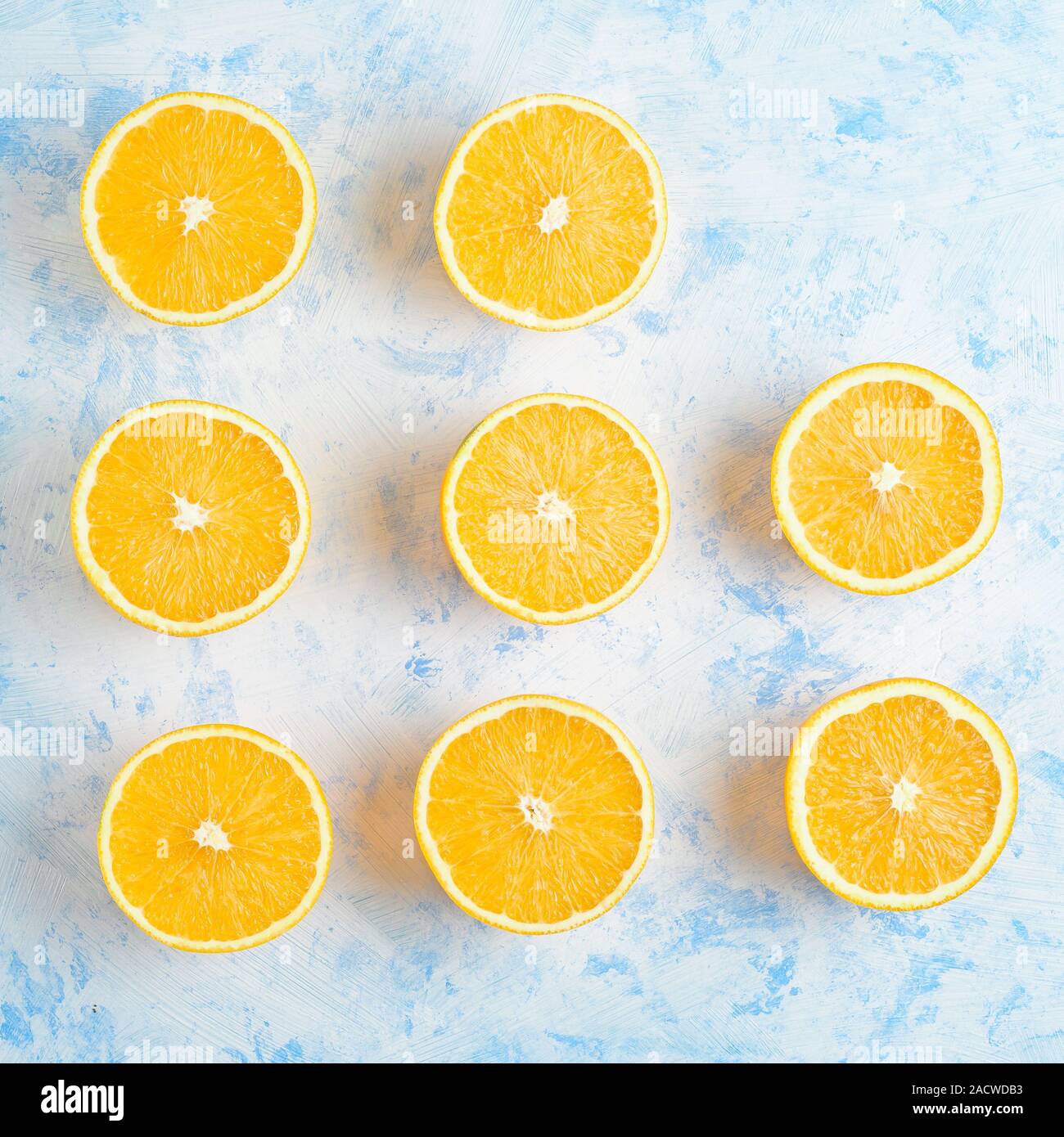 halves of oranges sliced for making orange juice Stock Photo - Alamy
