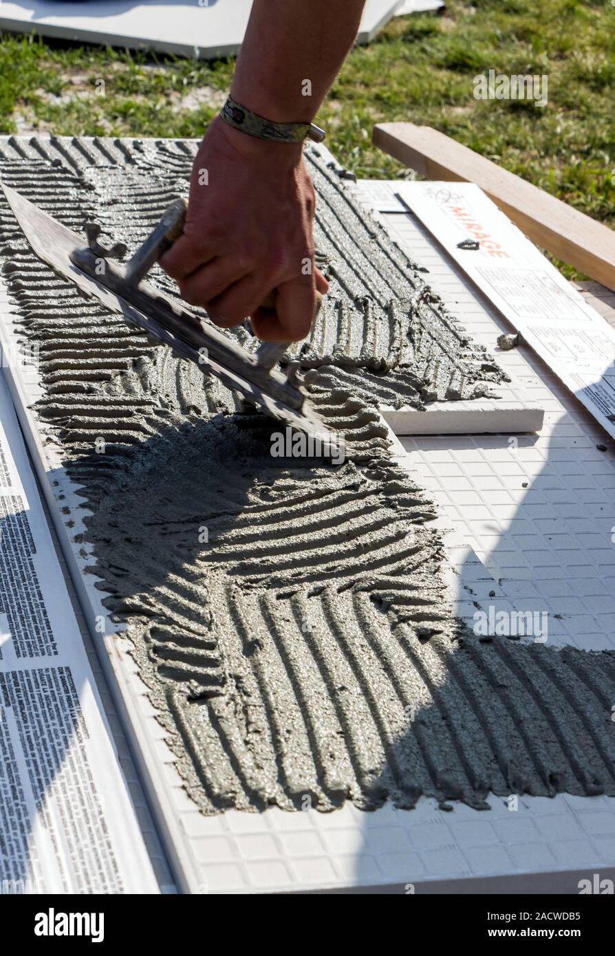 Filler for a tiler Stock Photo - Alamy