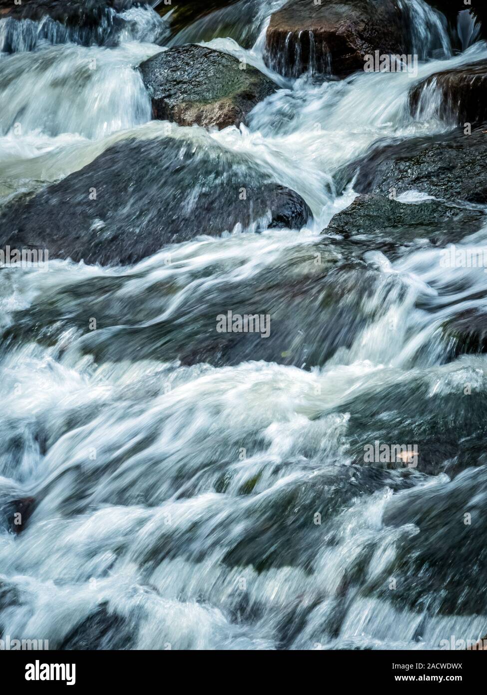 Stream with running water Stock Photo - Alamy