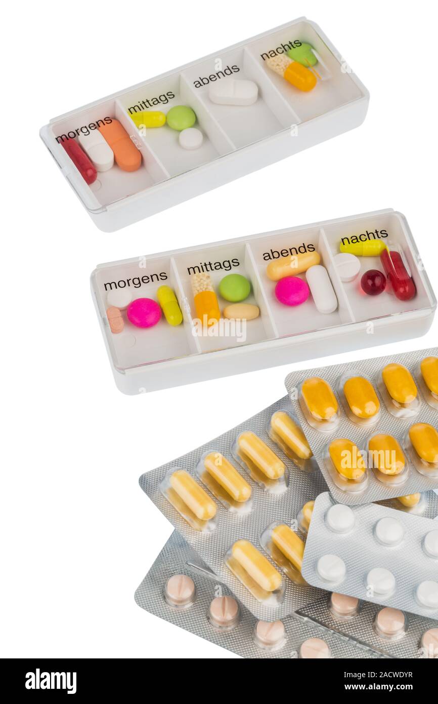 Tablet dispensers and tablets Stock Photo - Alamy