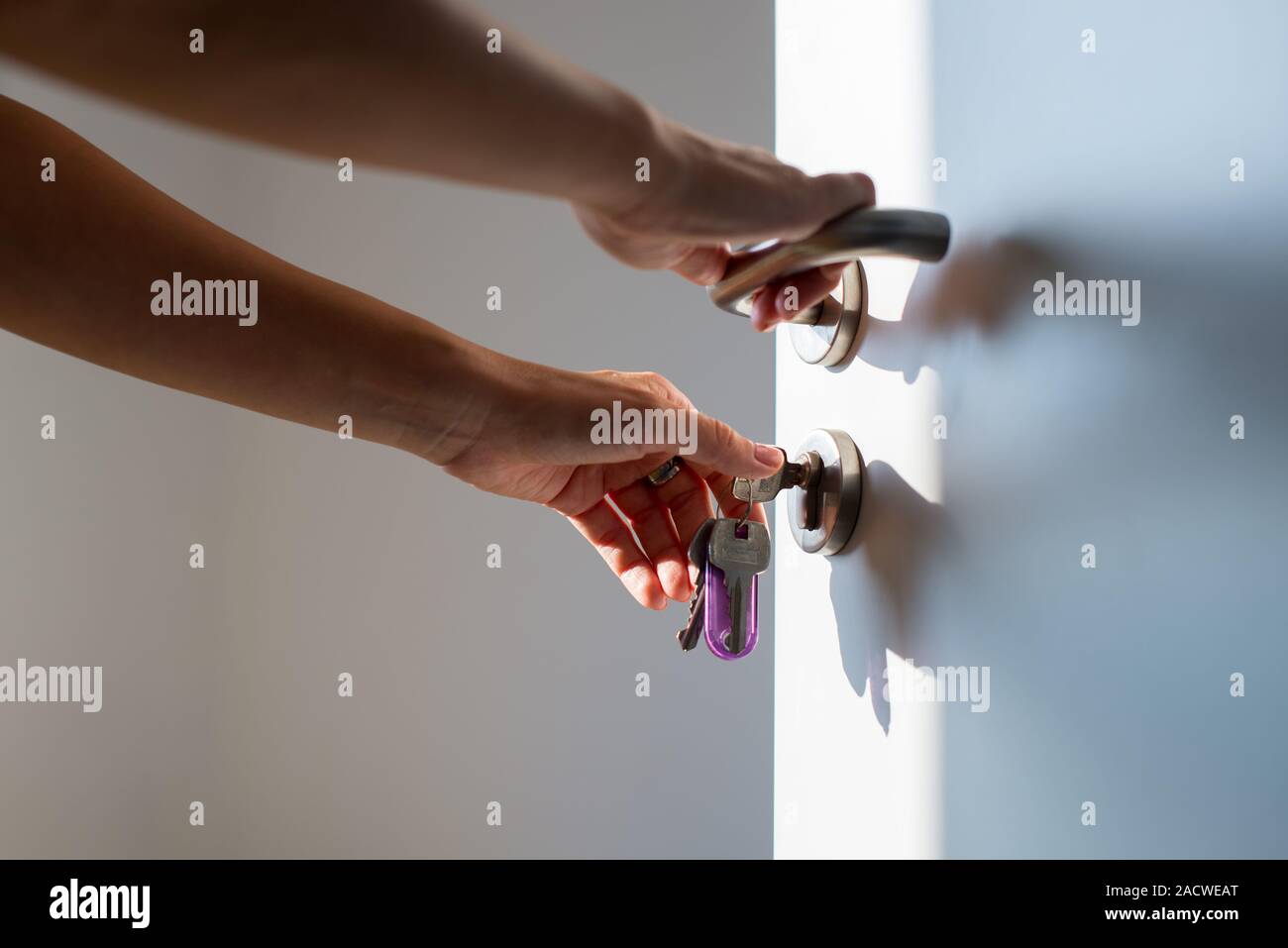 Hand unlocks hi-res stock photography and images - Alamy