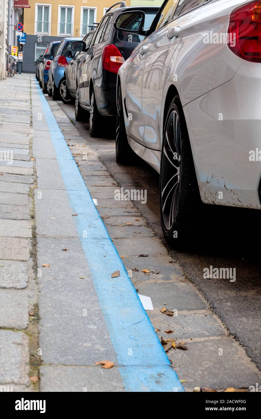 Blue zone and parking cars Stock Photo - Alamy