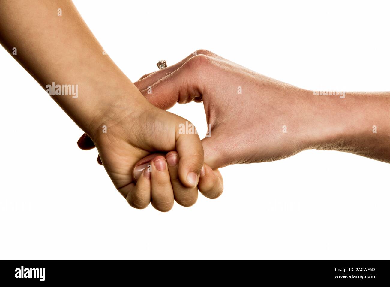 Small and big hand Stock Photo - Alamy