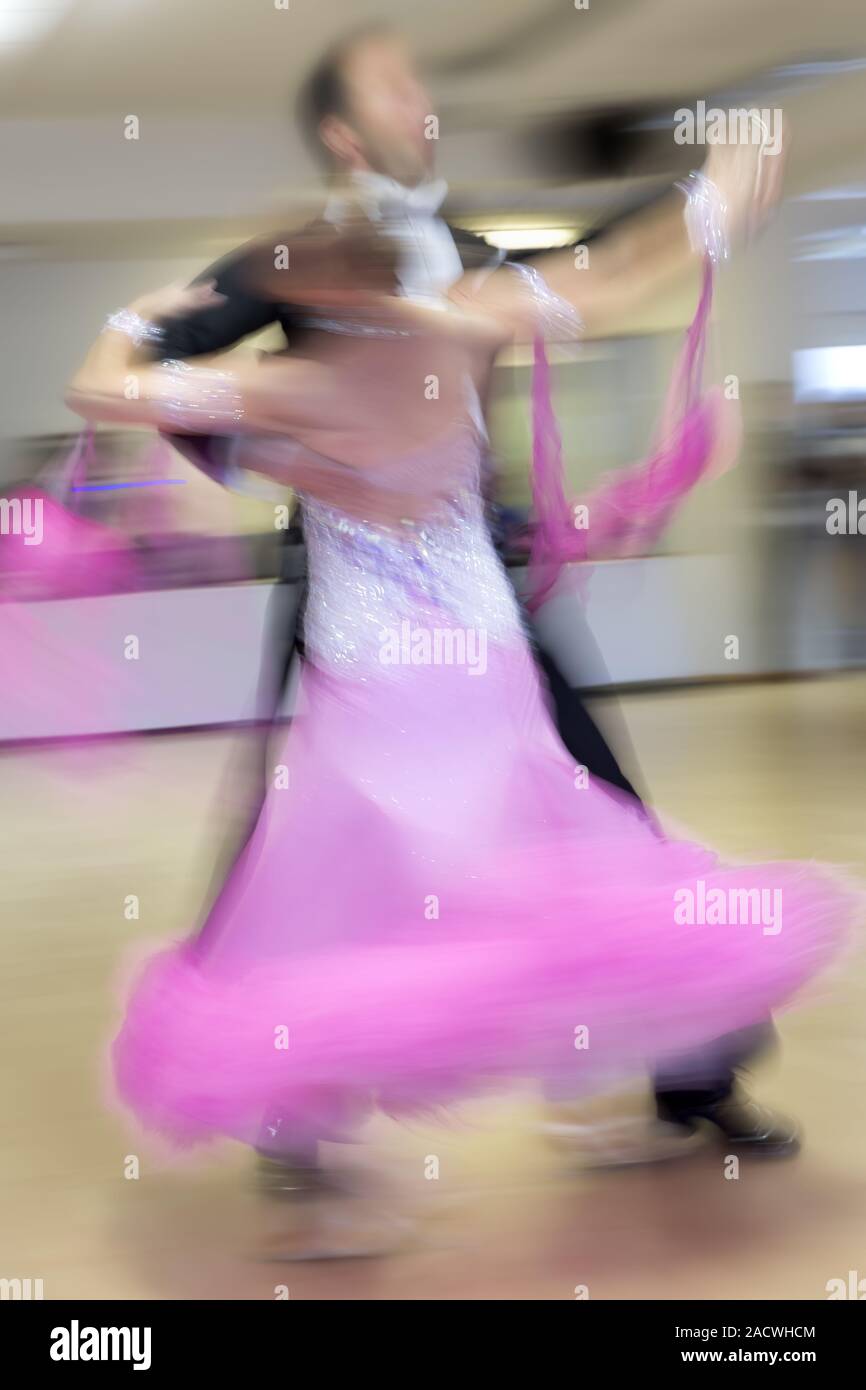 Dancing couple on dance competition, motion blur Stock Photo - Alamy