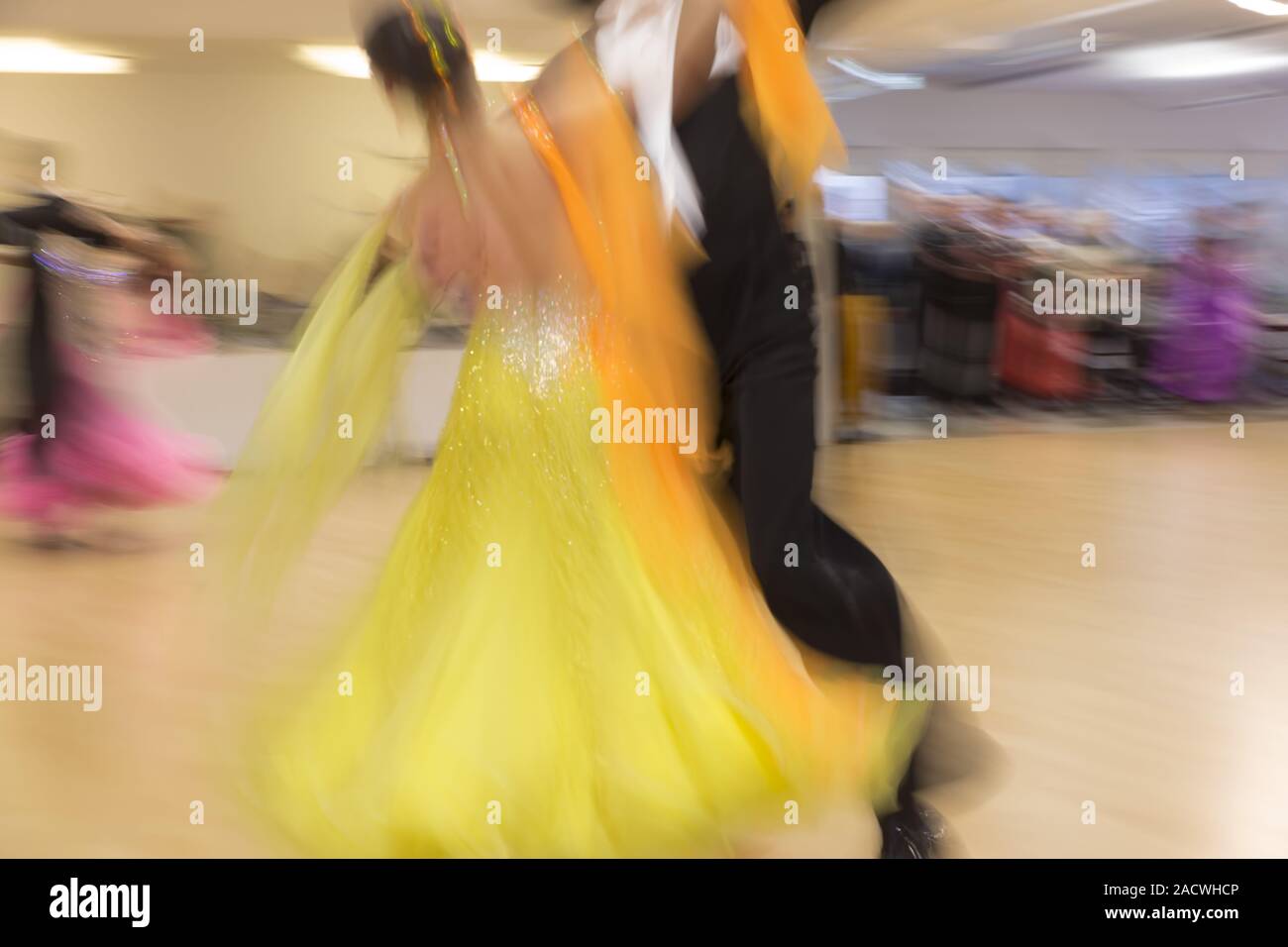 Dancing couple on dance competition, motion blur Stock Photo - Alamy