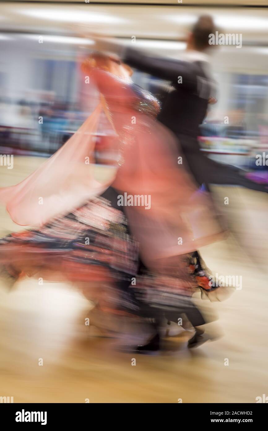 Dancing couple on dance competition, motion blur Stock Photo - Alamy