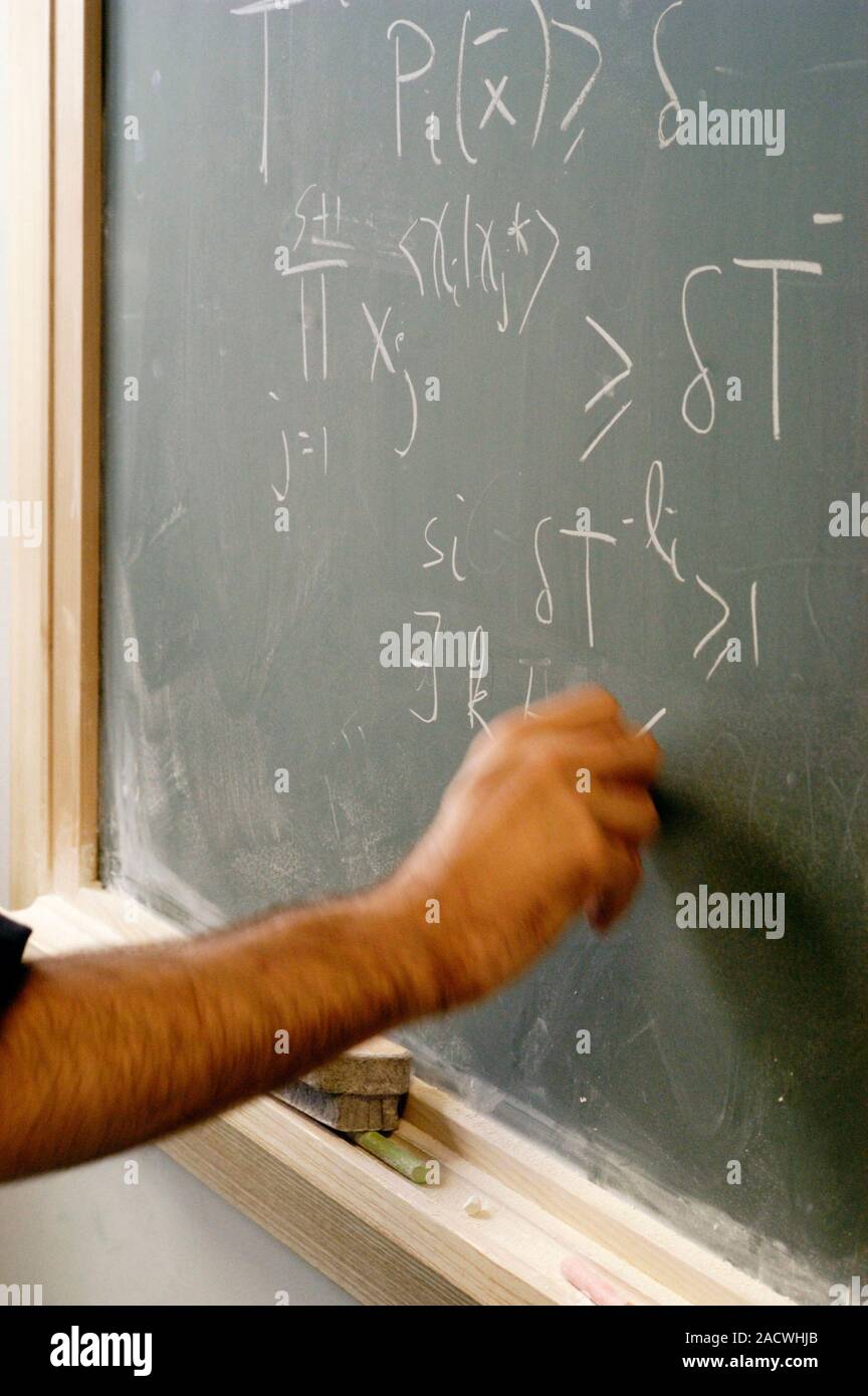 Mathematical research. Mathematician drawing symbols, formulae and ...