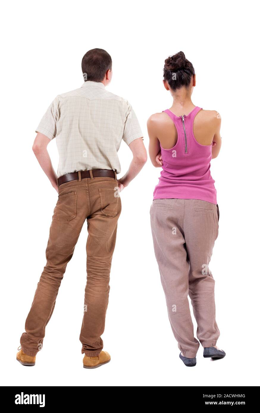 Back view of couple. beautiful friendly girl and guy together. Rear ...