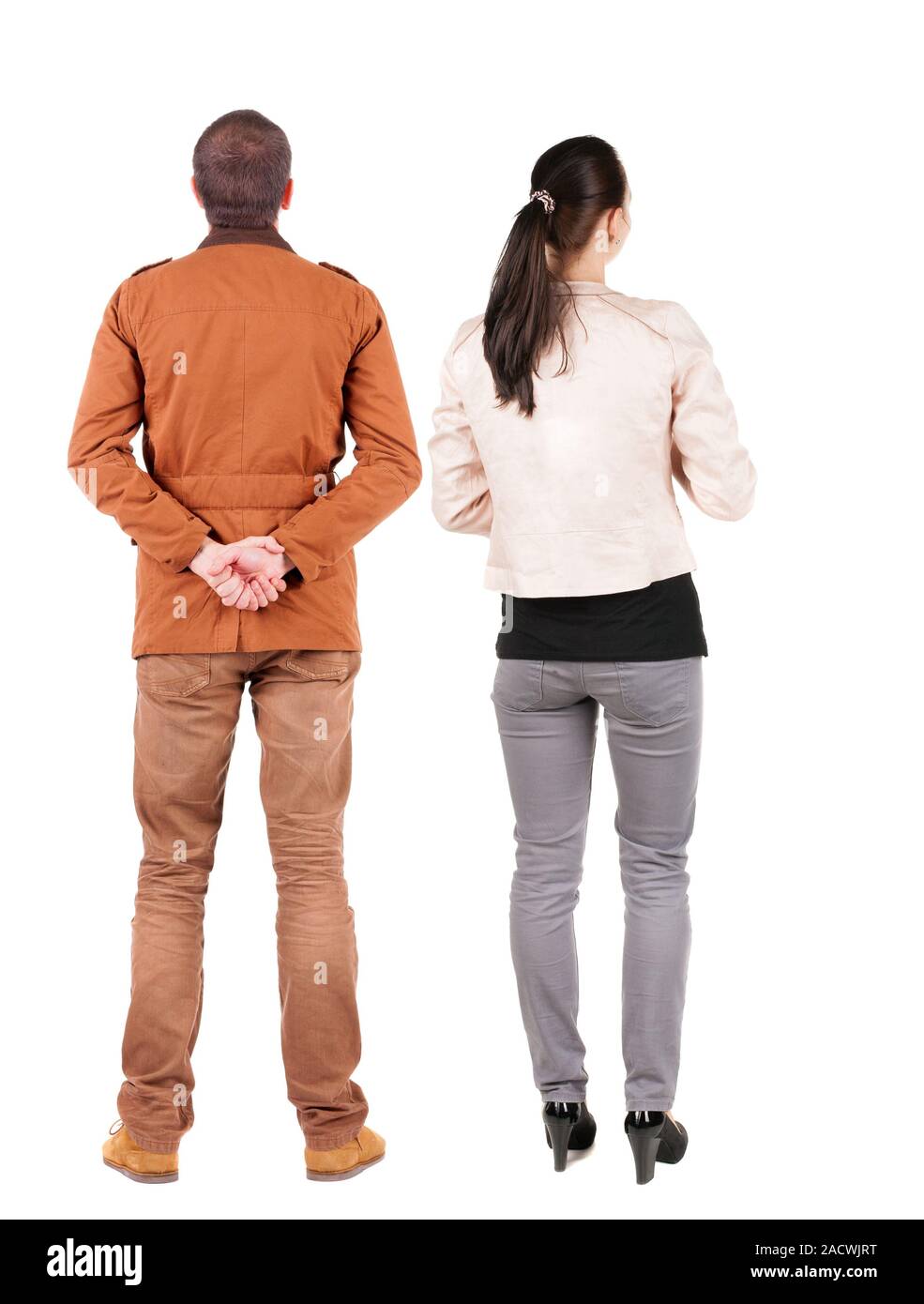 Back view of couple. beautiful friendly girl and guy together. Rear ...
