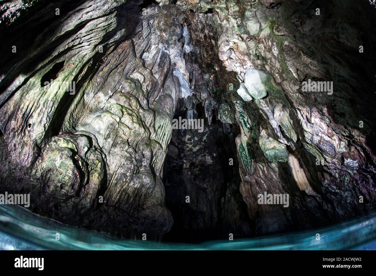 Flooded cave eroded from limestone. Limestone is easily eroded by ...