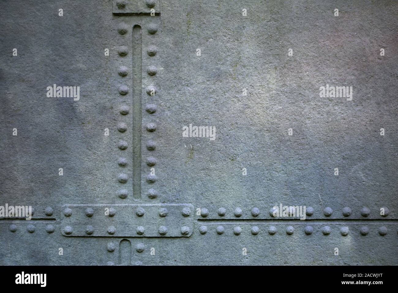 Metal plate with rivets, grunge Stock Photo - Alamy