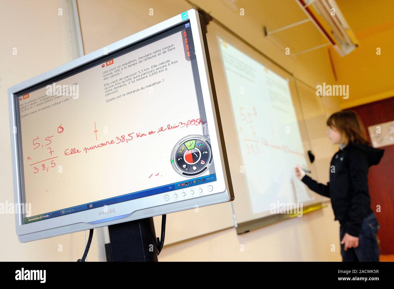 Interactive whiteboard being used during a maths class Stock Photo - Alamy