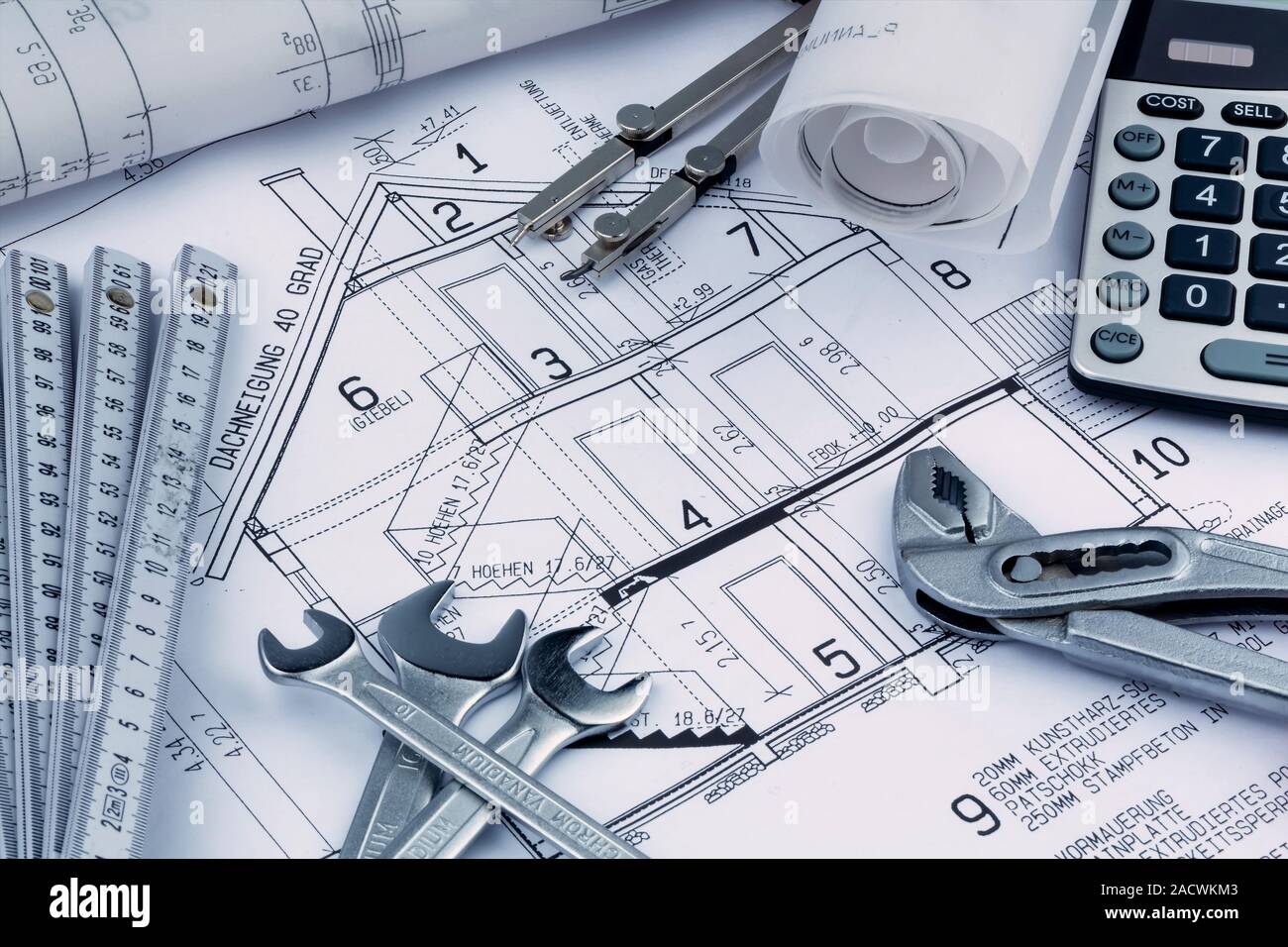 House plan with pocket calculator Stock Photo - Alamy