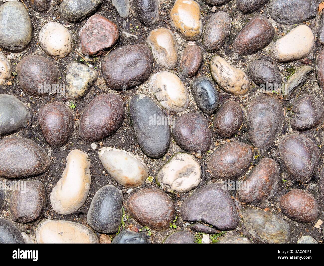 Various stones, background Stock Photo - Alamy