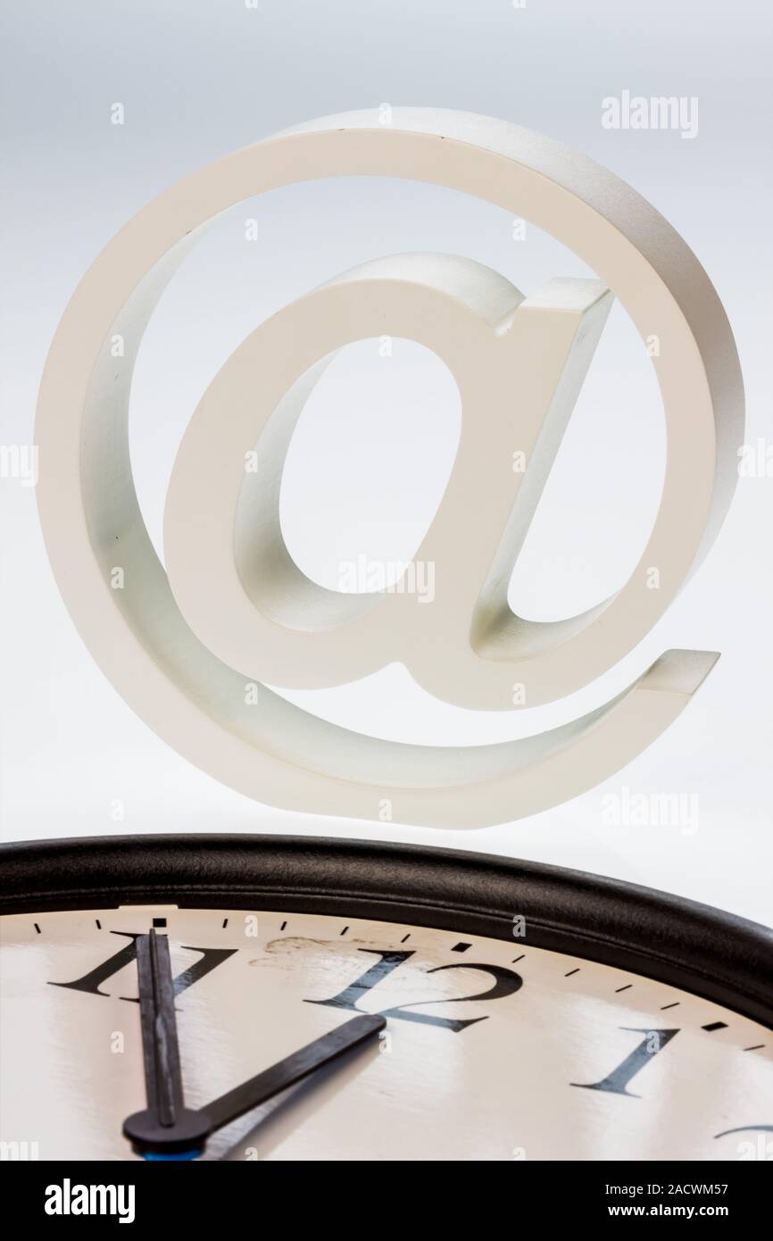 e-Mail sign and clock Stock Photo - Alamy