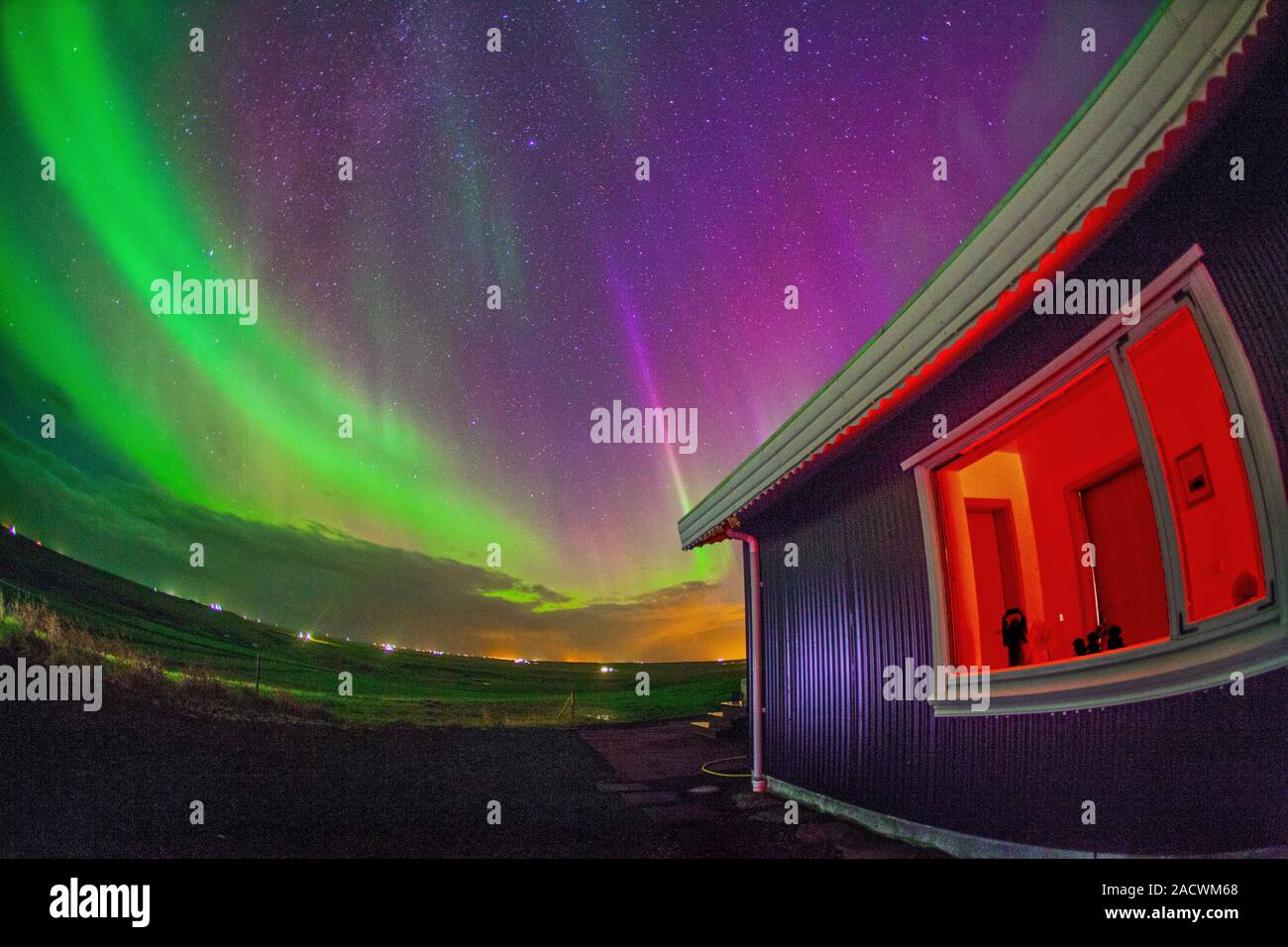 Auroral display (aurora borealis) in Iceland. This coloured light ...