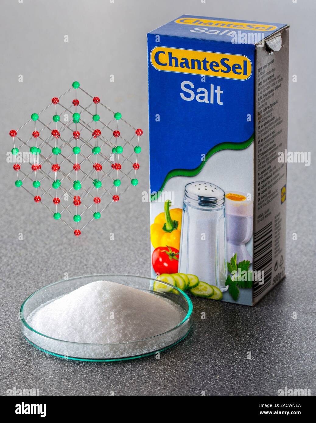 Packet of salt, a mole (58.5 grams) of salt in a dish, and a molecular ...