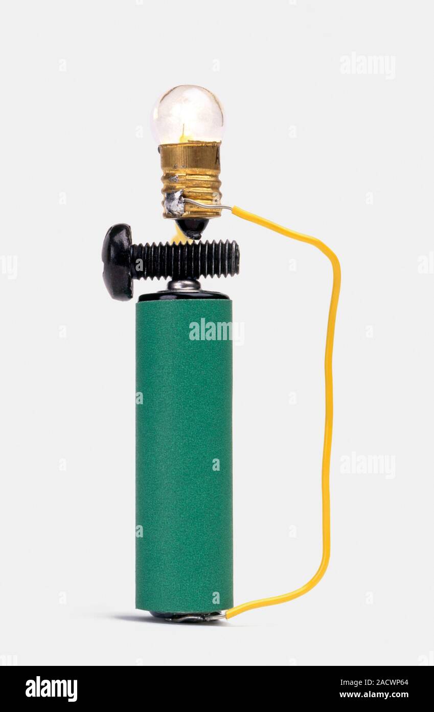Bulb resting on steel screw, wired to battery, illustrating principle ... Bulb resting on steel screw, wired to battery, illustrating principle ...