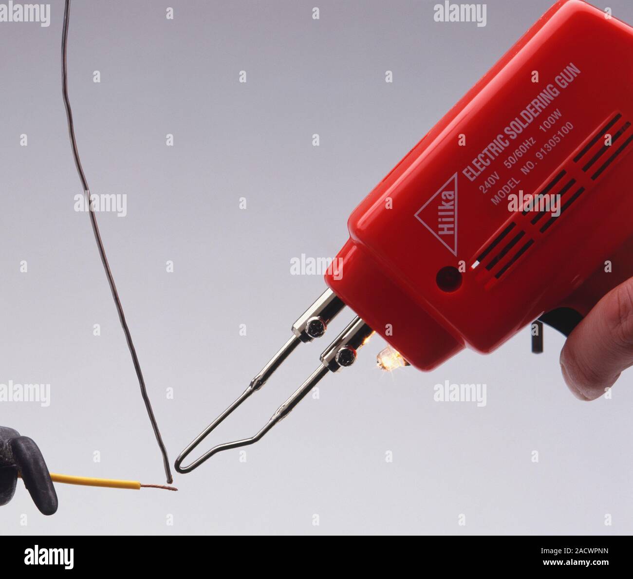Electrical soldering iron with solder and copper wire Stock Photo - Alamy