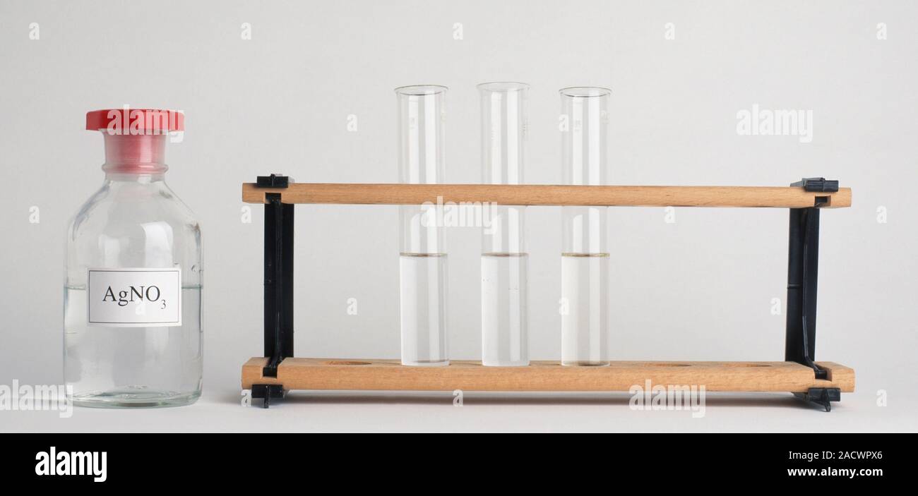 Three test tubes on rack and AgNO3 in chemical bottle Stock Photo - Alamy