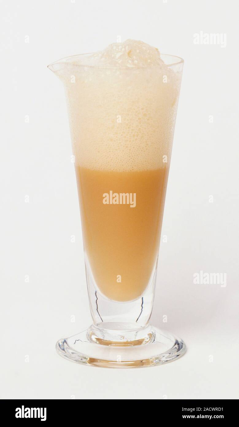 Yeast and sugar solution turned into froth of carbon dioxide (anaerobic ...