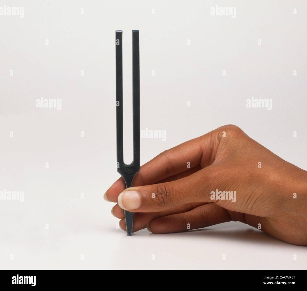 Demonstrating sound waves with a tuning fork and a microphone Stock ...