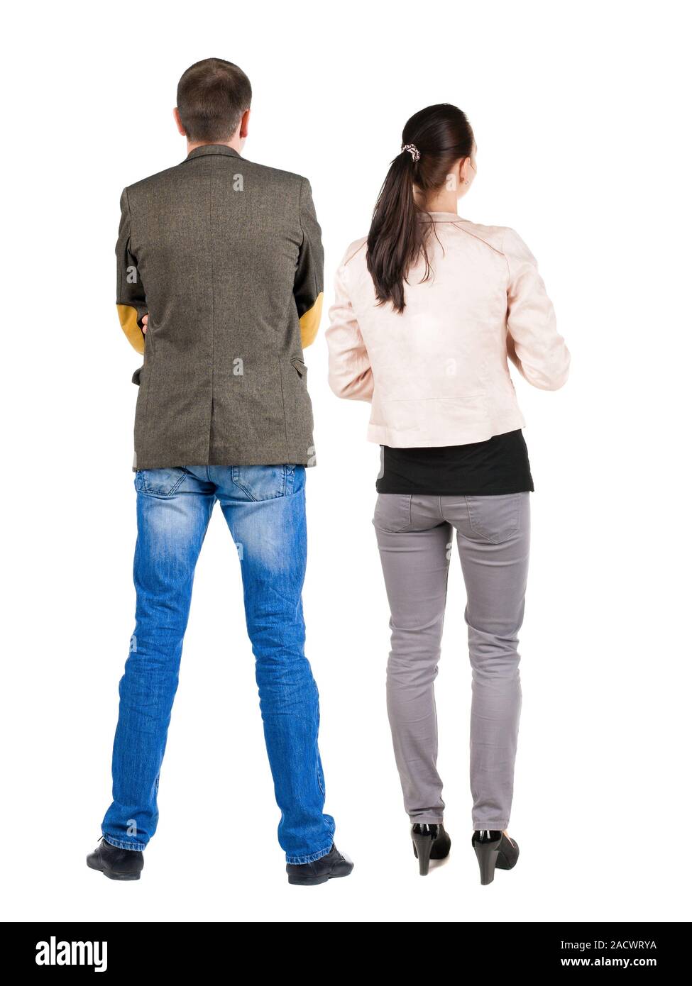 Back view of couple. beautiful friendly girl and guy together. Rear ...