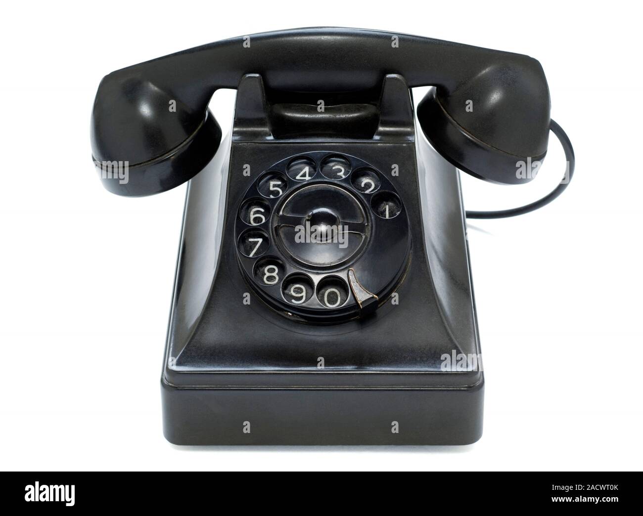 Bakelite telephone. Dial telephone with bakelite casing. Bakelite, the ...