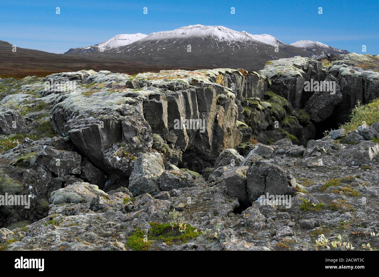 Tectonic plate boundary, Iceland, with snow-capped peaks in the ...