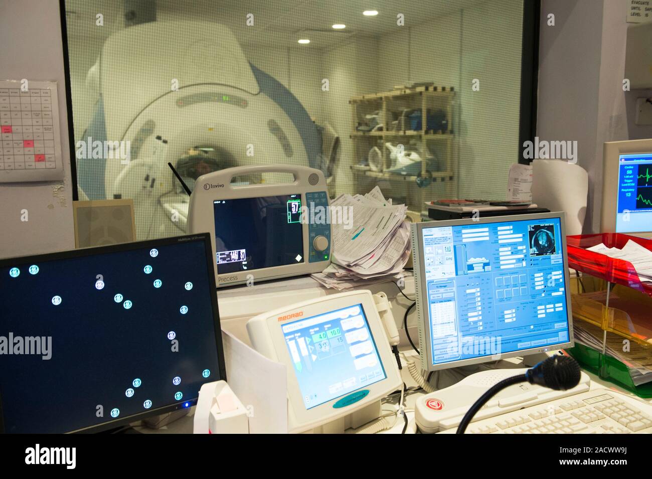 Cardiac MRI scanning. Display screens and magnetic resonance imaging ...