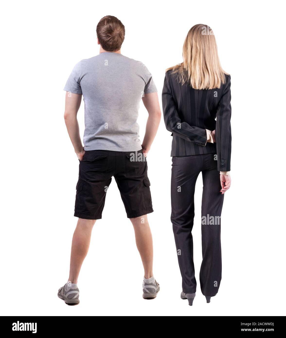 Back view of couple. beautiful friendly girl and guy together. Rear ...