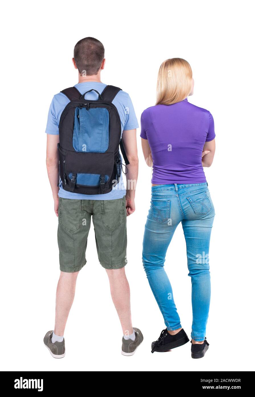 Back view of couple. beautiful friendly girl and guy together. Rear ...