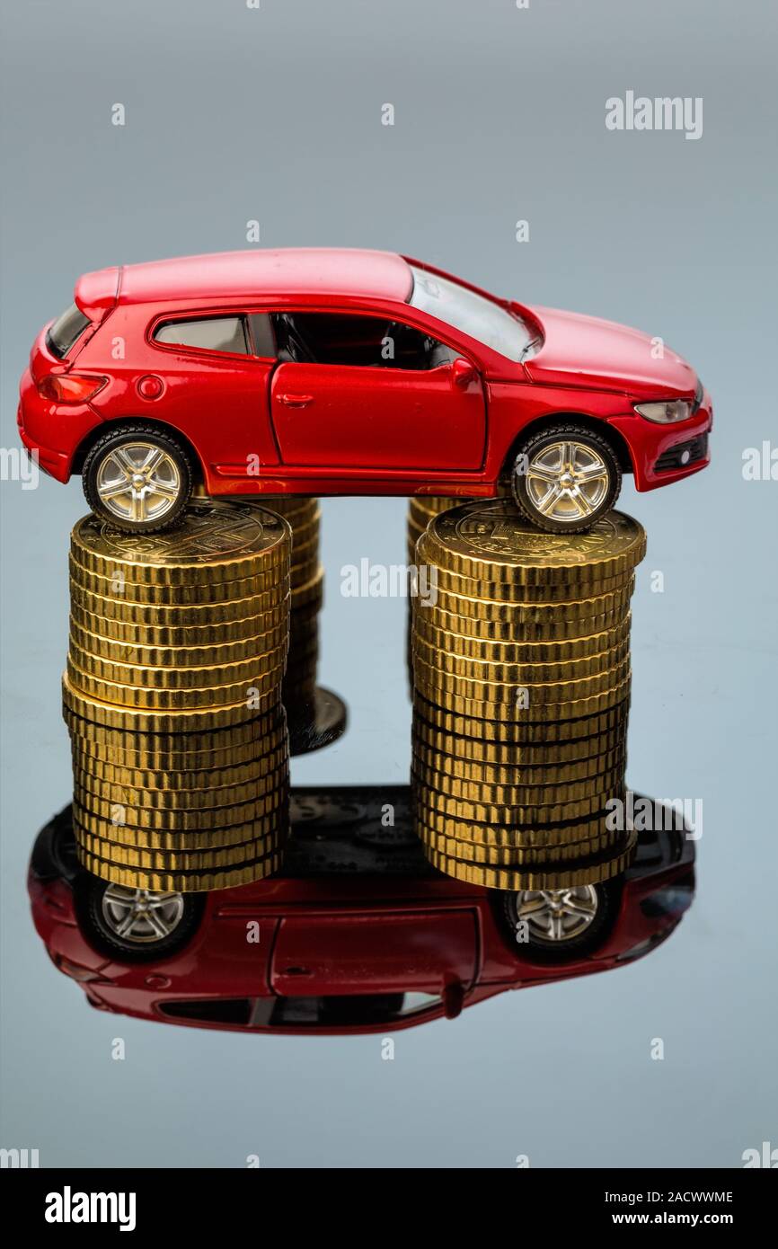 Car on coins hi-res stock photography and images - Alamy