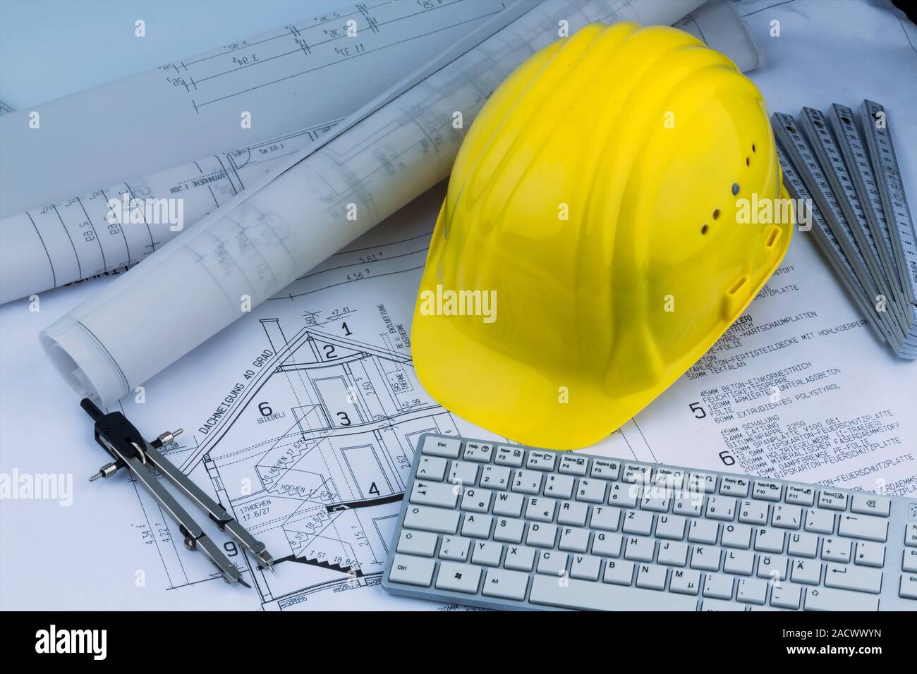 House plan with helmet of a construction worker Stock Photo - Alamy