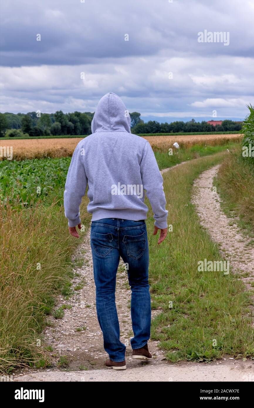 Man goes on his way Stock Photo - Alamy